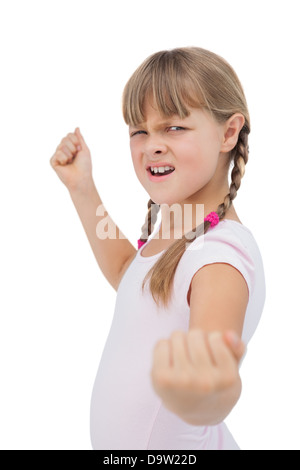 Little girl child yelling, shouting and screaming with bad manners. Angry upset girl is arguing ...