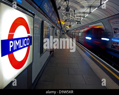 Underground train at the Pimlico station on the Victoria line, London ...