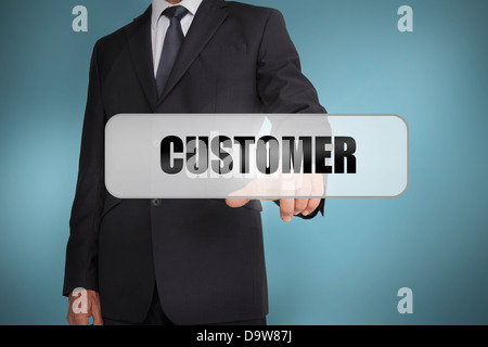 Businessman selecting the word customer written on white tag on blue ...