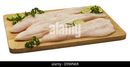Raw cod on a cutting board Stock Photo - Alamy