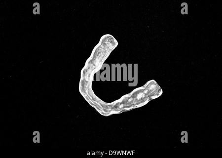 A lower, full coverage occlusal splint Stock Photo - Alamy
