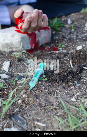 Crime scene with male corpse and evidence markers Stock Photo - Alamy