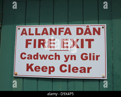 Bilingual welsh and english sign for fire and emergency assembly point ...