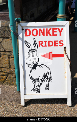 Donkey rides sign Stock Photo - Alamy