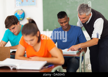 Male high school senior student athlete, poses in hallway of his Austin ...