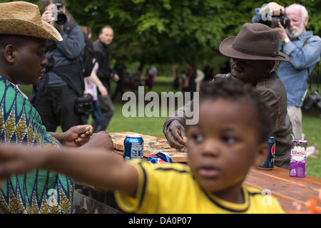 Two men play a traditional Yoruba game, Ayo Stock Photo - Alamy