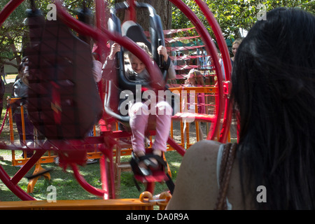 Children enjoy tumble ride Stock Photo - Alamy