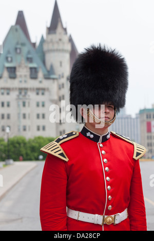 A Canadian honour guard poses for visitors during Canada Day ...