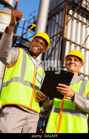 The oil workers at work Stock Photo - Alamy