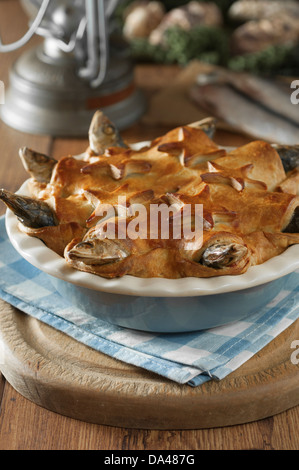 Stargazy pie West Country fish dish Cornwall UK Stock Photo - Alamy
