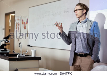 Male professor teaching in college science lab Stock Photo - Alamy
