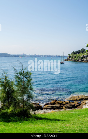 Parsley Bay in Sydney with its cove, pedestrian bridge, beach and ...
