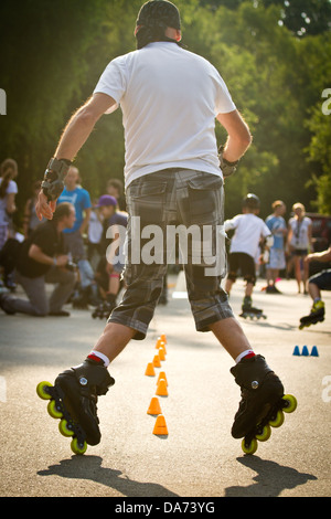 Man Rollerblading for exercise Stock Photo - Alamy