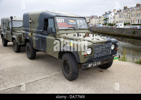 An Army reserve force Land Rover heads along a cattle station track in ...
