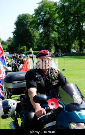 Bakewell carnival parade in Derbyshire 2009. marching band in kilts ...