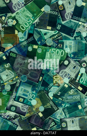 many 100 euro bills and coins on gray background top view Stock Photo ...