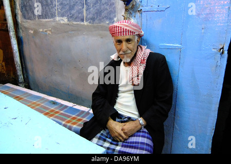 Yemen, Sana'a Yemeni man near Bab Al Sabah, in traditional dress, with ...