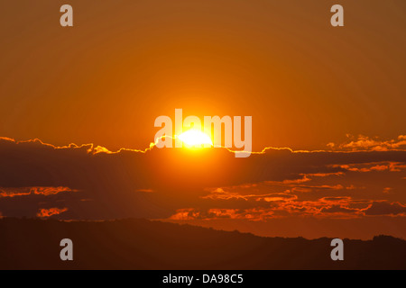 SUNSET CLOUDS OVER LAND Stock Photo - Alamy
