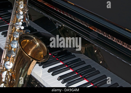 Piano and saxophone, closeup Stock Photo - Alamy