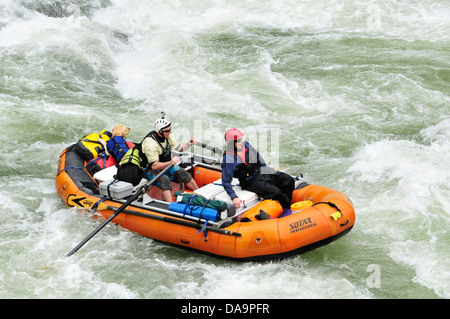 Tom and Alek rafting through the rapids at C Rock on the Wild and ...