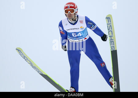 Finnish ski jumper Matti Hautamaeki jumps from the Olympic ski-jump ...