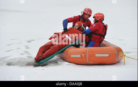 Members of the German Red Cross Water Rescue service perform a rescue ...