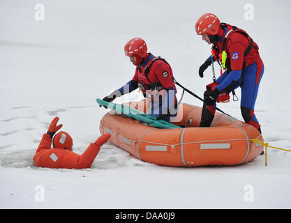 Members of the German Red Cross Water Rescue service perform a rescue ...