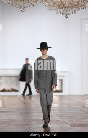 A model wears a creation as part of the Dior Homme Spring Summer 2027 ...