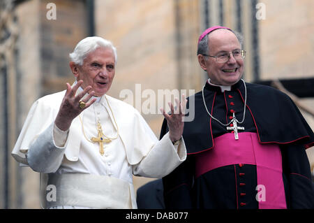 Pope Benedict XVI (L) speaks with Erfurt's Bishop Joachim Wanke after ...