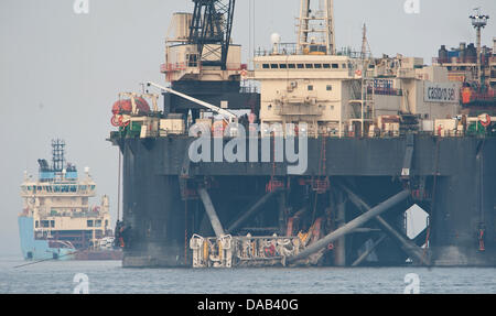 The pipe-laying vessel 'Castoro Sei' is towed by an anchor handling tug ...