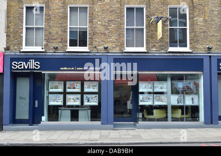 London- Savills estate agent exterior sign Stock Photo - Alamy