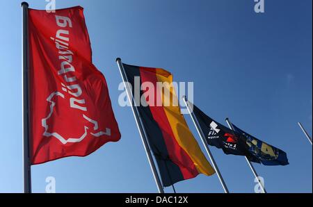 The German flag and the flags of the FIA and the Formula One seen at ...