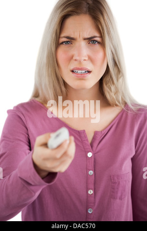 beautiful blonde woman is angry about her remote control Stock Photo ...