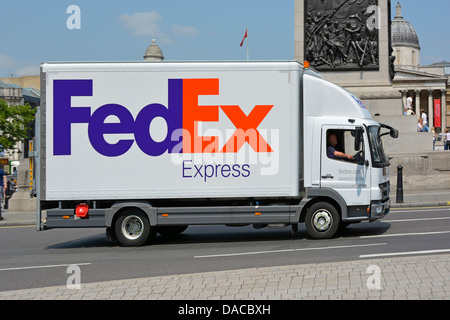 Side view FedEx Express transport delivering packages & freight via hgv ...