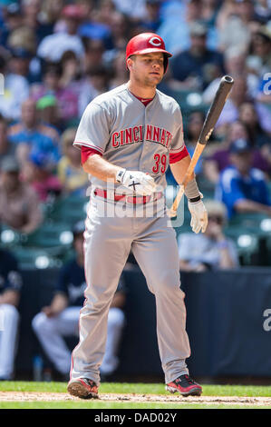 Cincinnati Reds catcher Devin Mesoraco tags out Milwaukee Brewers' Jeff ...