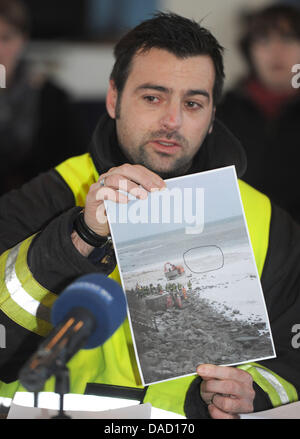 Chief of operations Daniel Hartlieb shows a photo indicating a possible ...