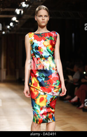 A model wears a creation by German designers Johnny Talbot and Adrian ...