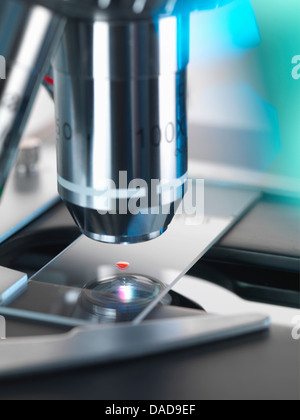 Blood testing, A light microscope examining a sample of blood in a lab ...
