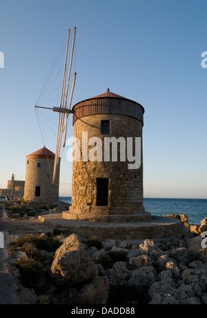 Windmills in the Mandraki port of Rhodes, Greece Stock Photo - Alamy
