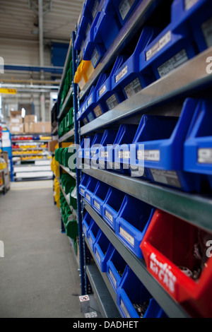 factory stockroom boxes on shelf Stock Photo - Alamy