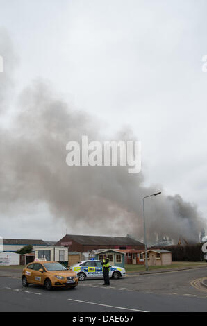 Grimsby, Lincolnshire, UK. 11th July, 2013. Fire at recycling centre ...
