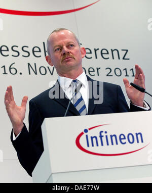 Chairman of Infineon Peter Bauer speaks during a press conference on ...
