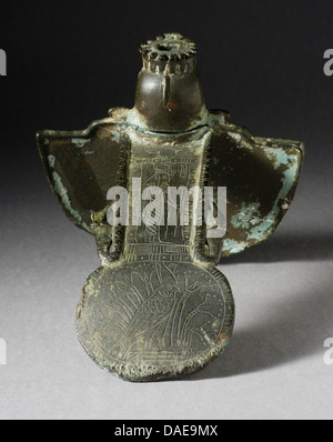 This ancient artifact represents the head of a goddess, adorned with ...