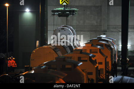 The castor containers with nuclear waste is moved from the train onto ...