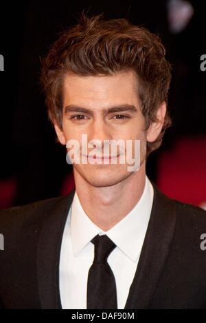British actor Andrew Garfield poses for the photographer, in London ...