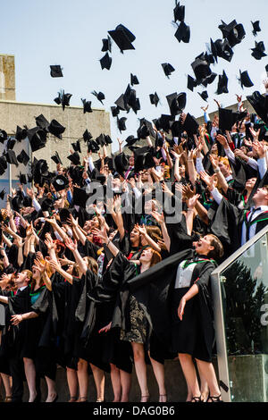 Aberystwyth University graduation day - four graduates two men two ...