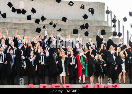 Aberystwyth University graduation day - four graduates two men two ...