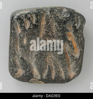 This stamp seal features a gabled design with a rounded apex, commonly ...