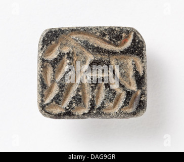 This stamp seal, with a gabled and rounded back, was used in ancient ...
