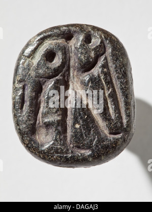 This stamp seal is made of bronze and features a cartouche, an oval ...